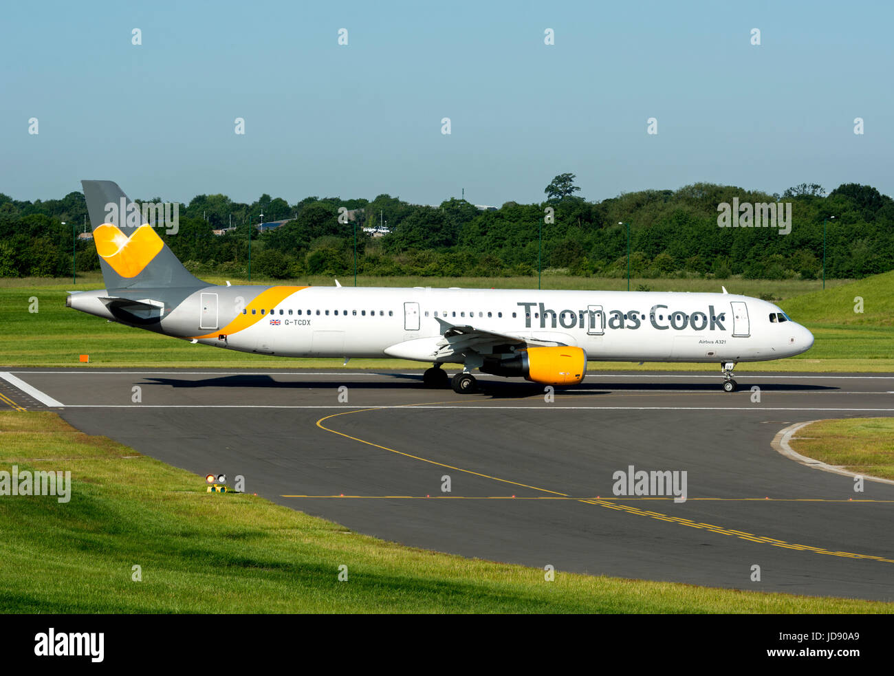 Thomas Cook Airbus A321 ready for take off at Birmingham Airport, UK (G ...