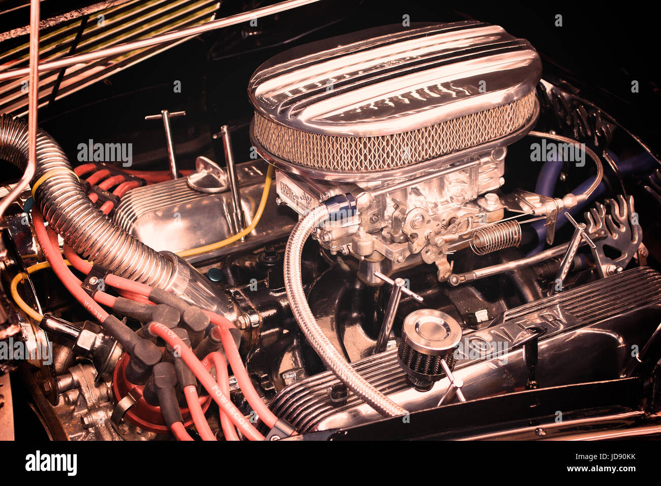 A customised power unit inside the engine bay of a classic vintage ...