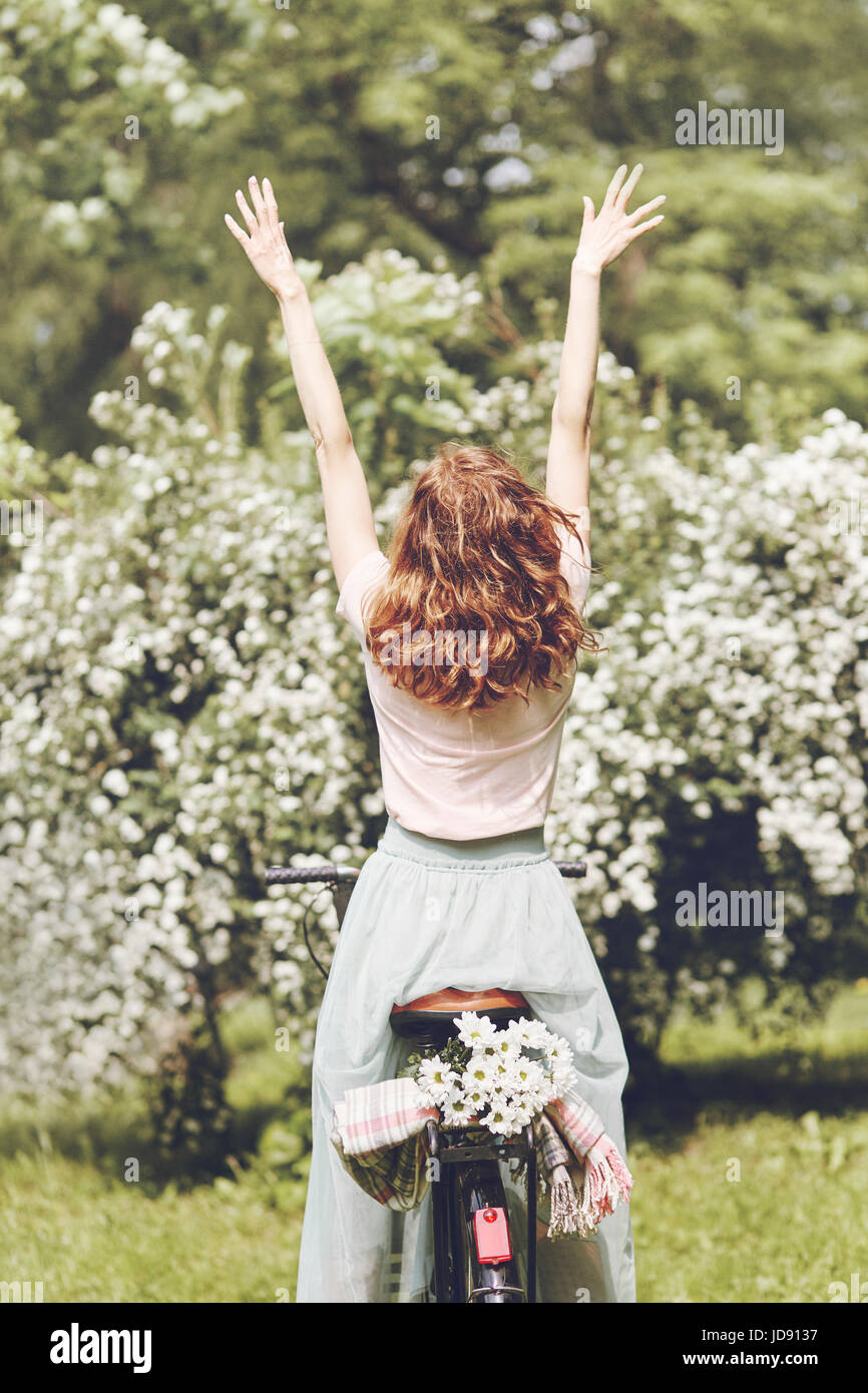 Full of energy woman in spring Stock Photo - Alamy