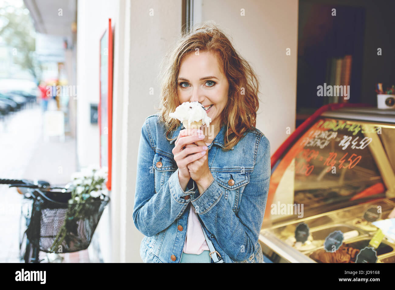 Summer portrait of woman with ice cream Stock Photo - Alamy