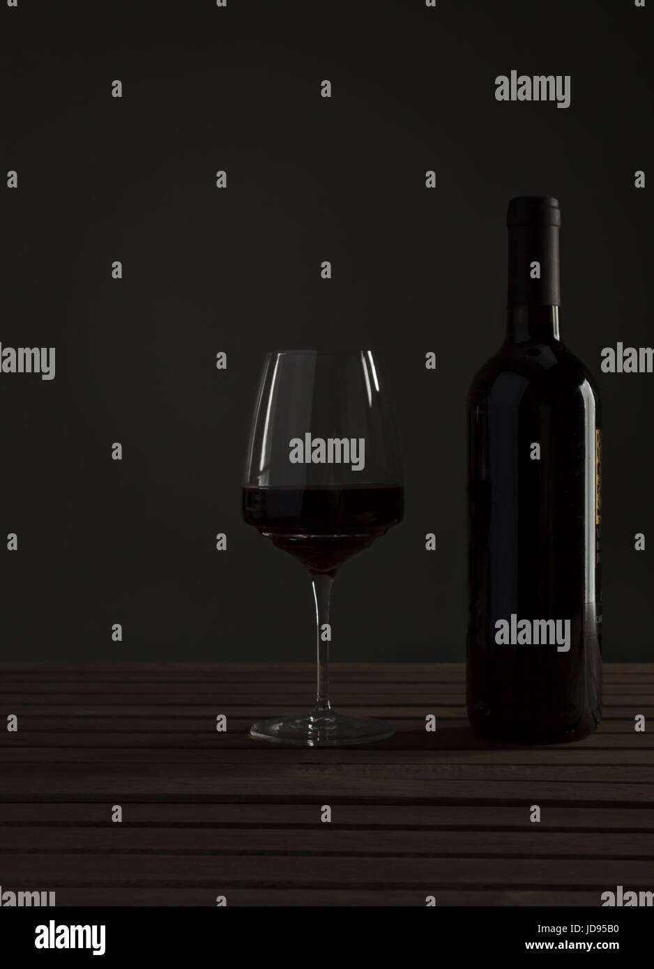 Italian red wine in bottle and glass Stock Photo - Alamy