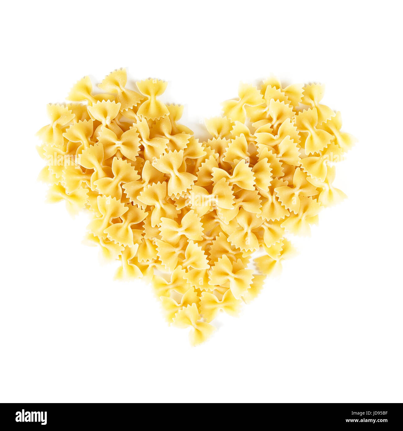 Heart shape heap of Farfalle or bow tie pasta isolated on white Stock ...