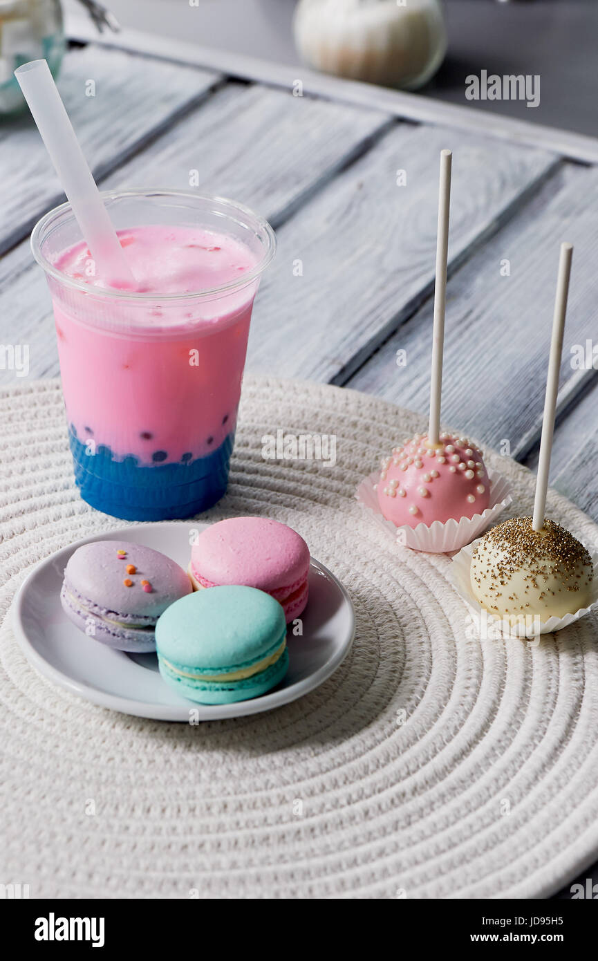 bubble tea in pink and blue color in a plastic Cup with a straw. Soft ...