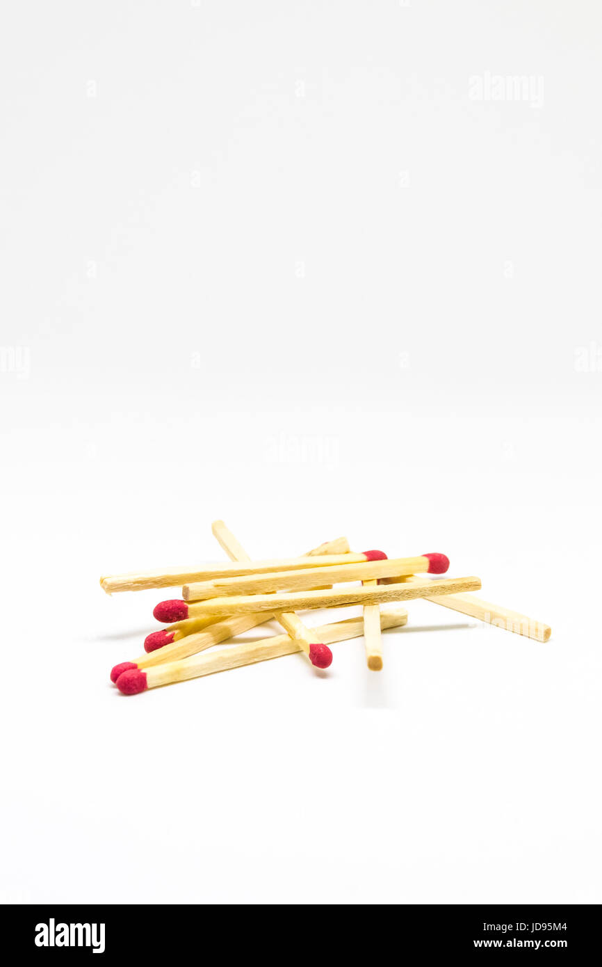 Scattered matches on White Background Stock Photo - Alamy