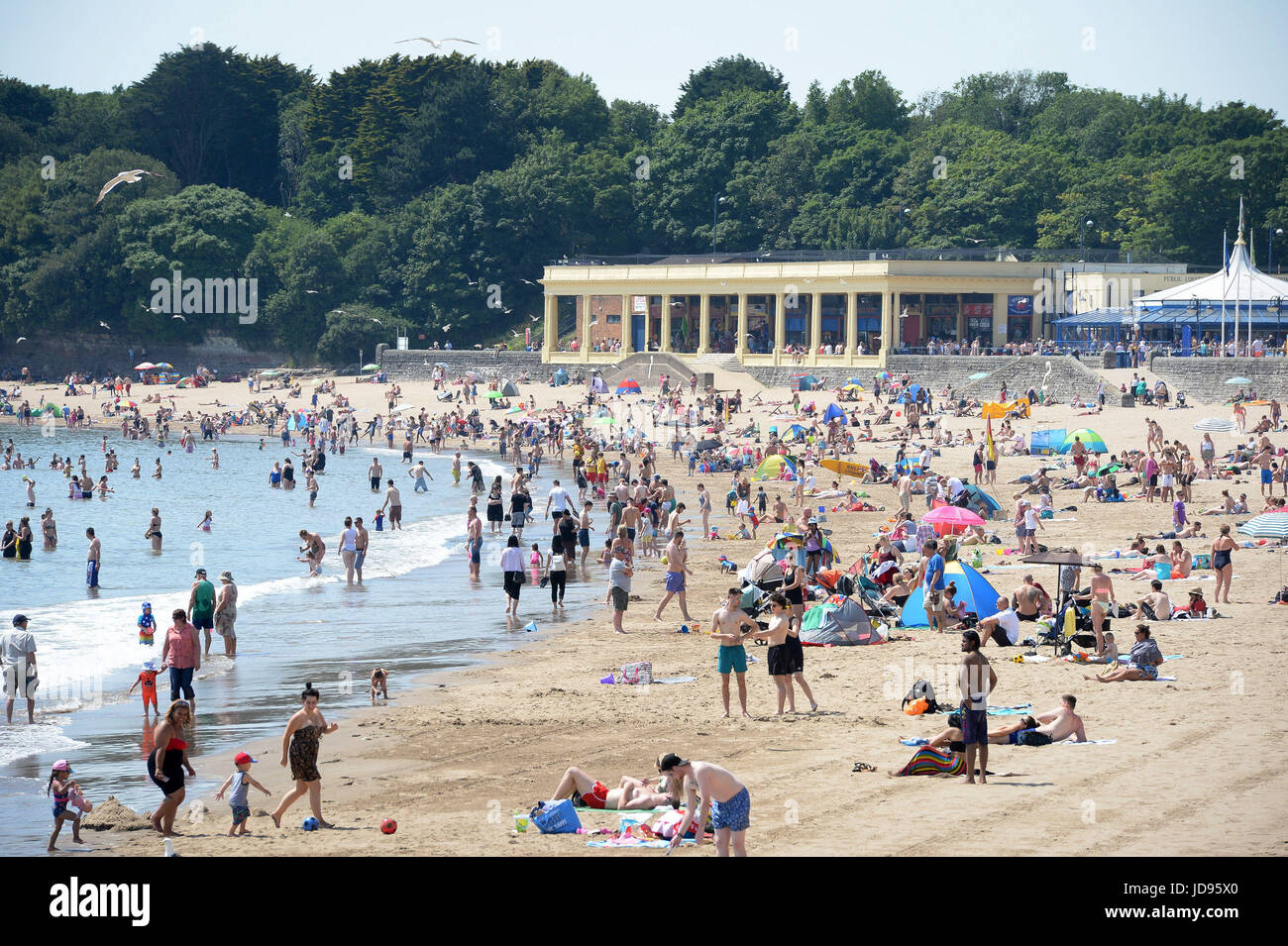 People pack the beach at Barry Island, South Wales, where temperatures ...