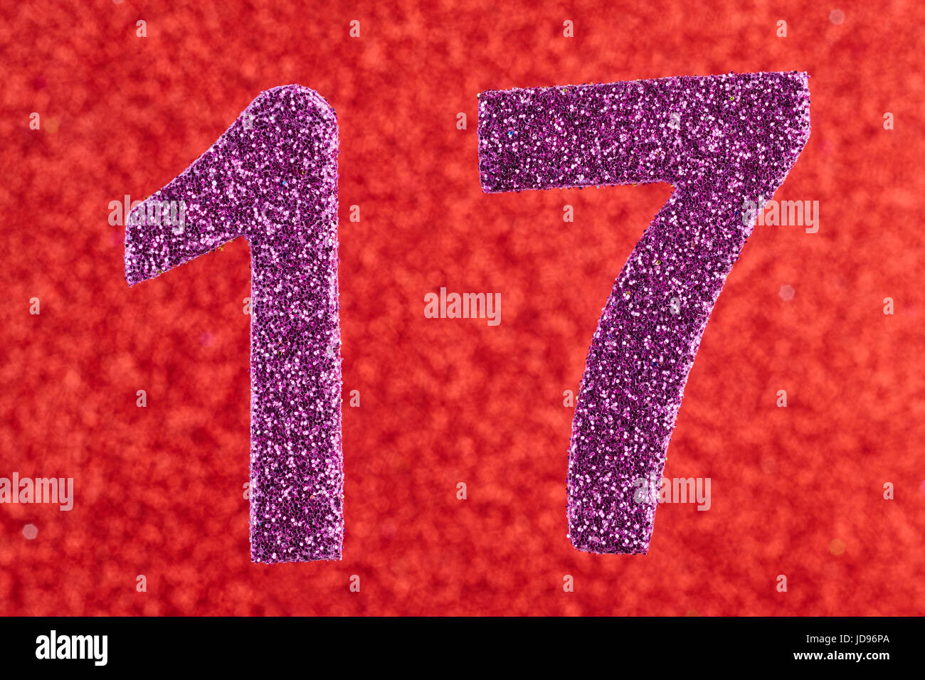 Number seventeen purple color over a red background. Anniversary ...