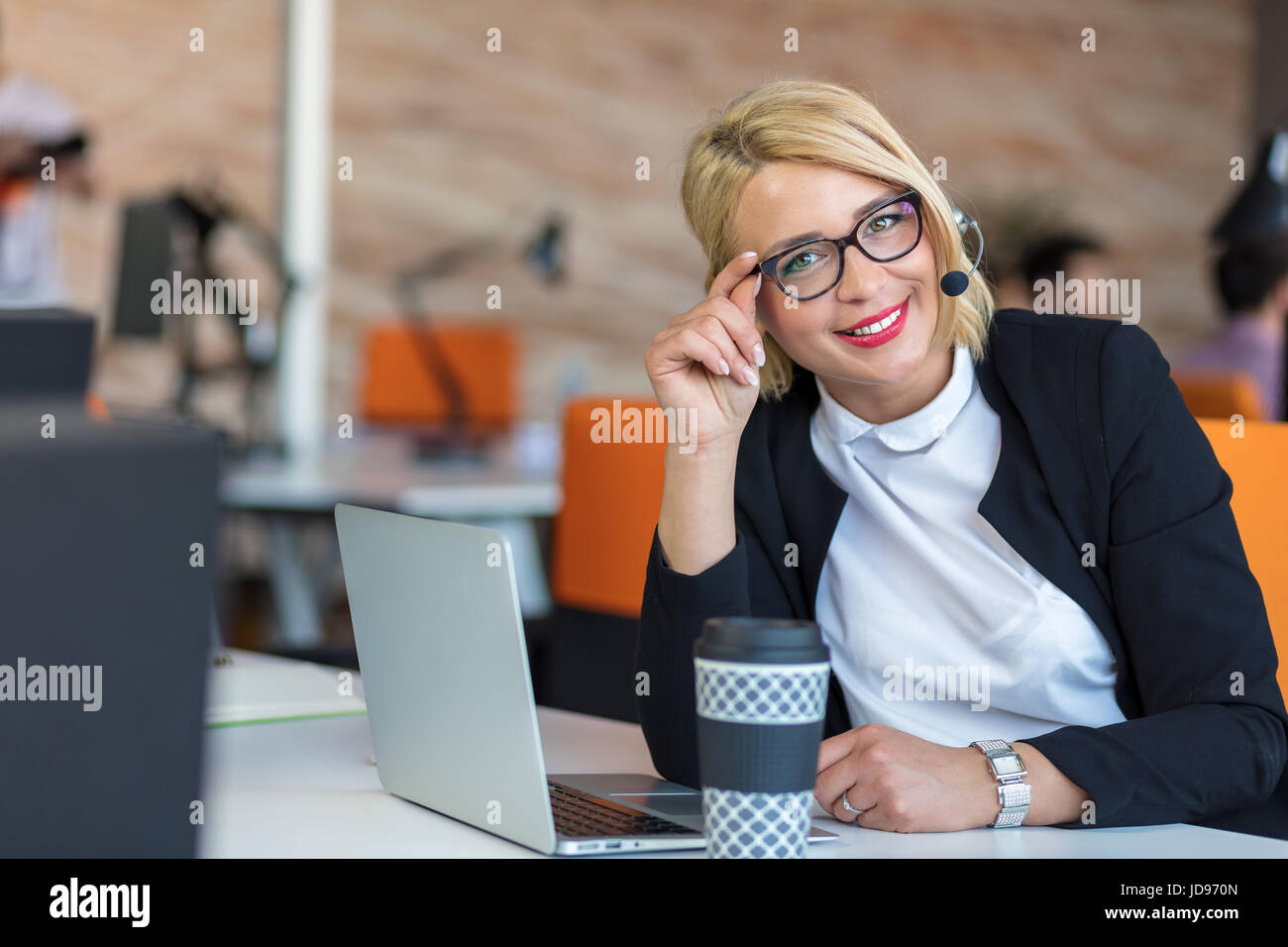 Customer service representative at work. Beautiful young woman in ...