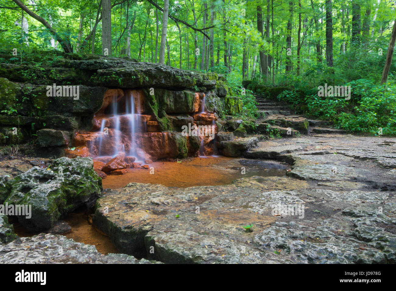 Water flowing from the yellow spring at Glen Helen Nature Preserve ...