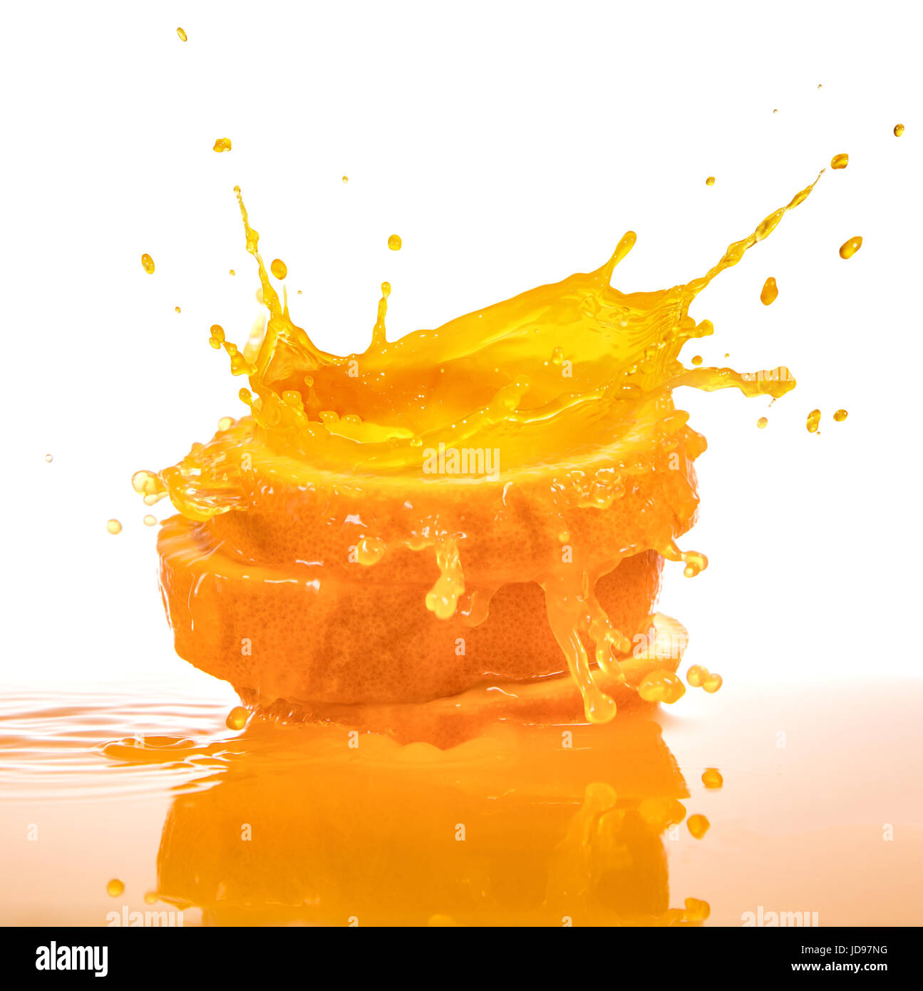 splashing orange juice Stock Photo - Alamy