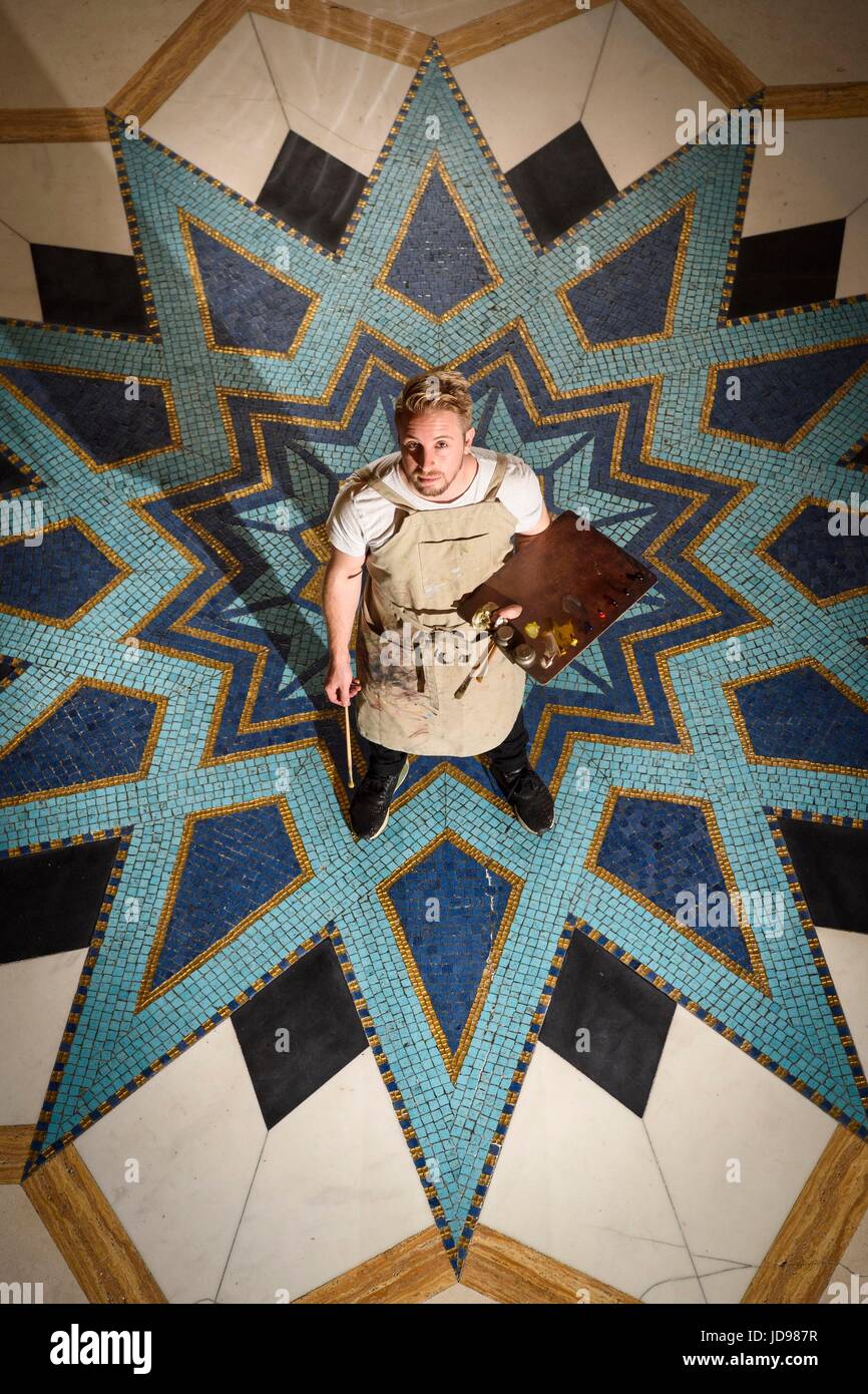 Artist Jacques Viljoen pictured working in Freemasons' Hall in central ...