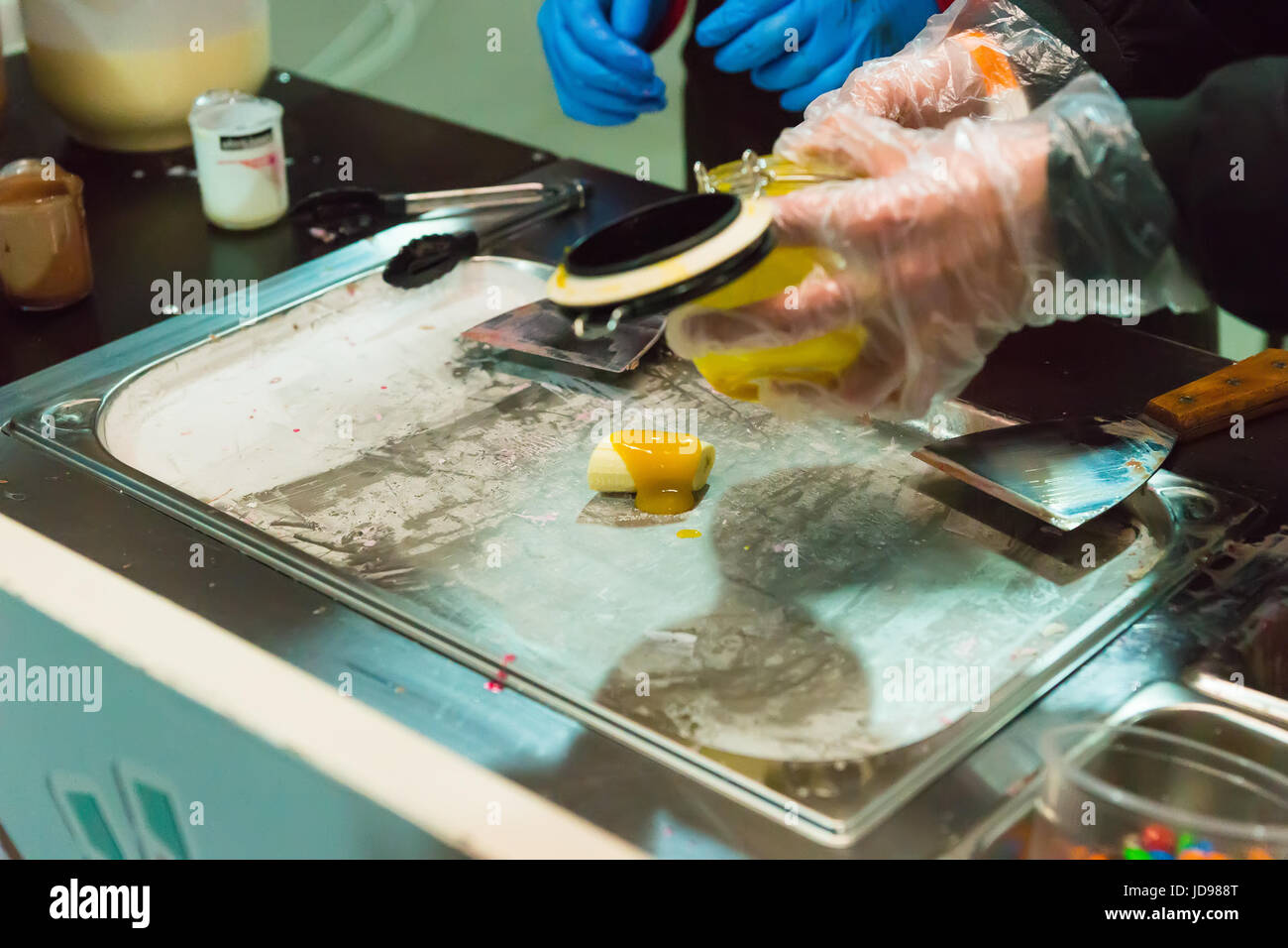 The process of preparing natural ice cream with banana on special ...