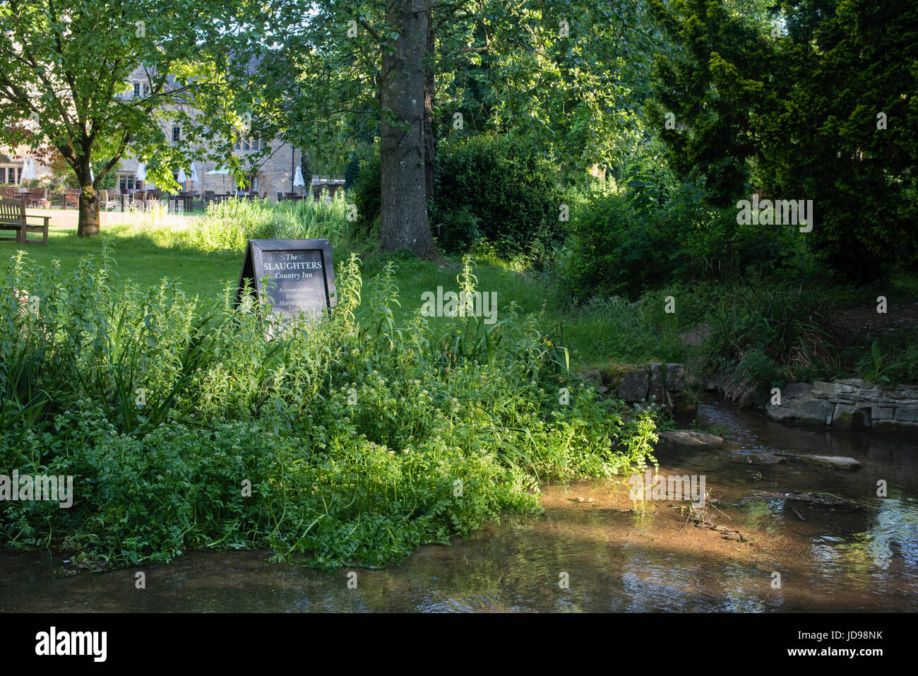 The slaughters country inn sign in the early morning june sunshine ...