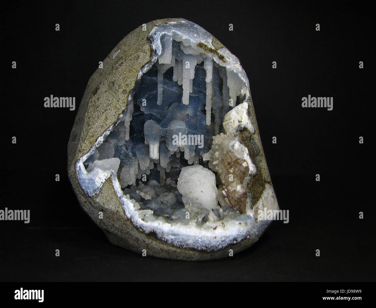 Geode with quartz encrusting the cavity and forming stalactites Stock ...