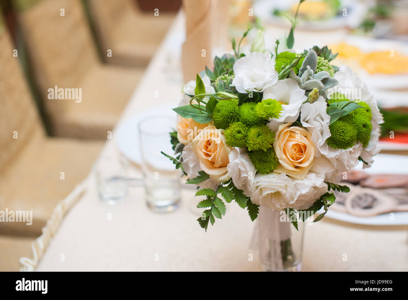 Wedding bouquet on the table in restaurant Stock Photo - Alamy