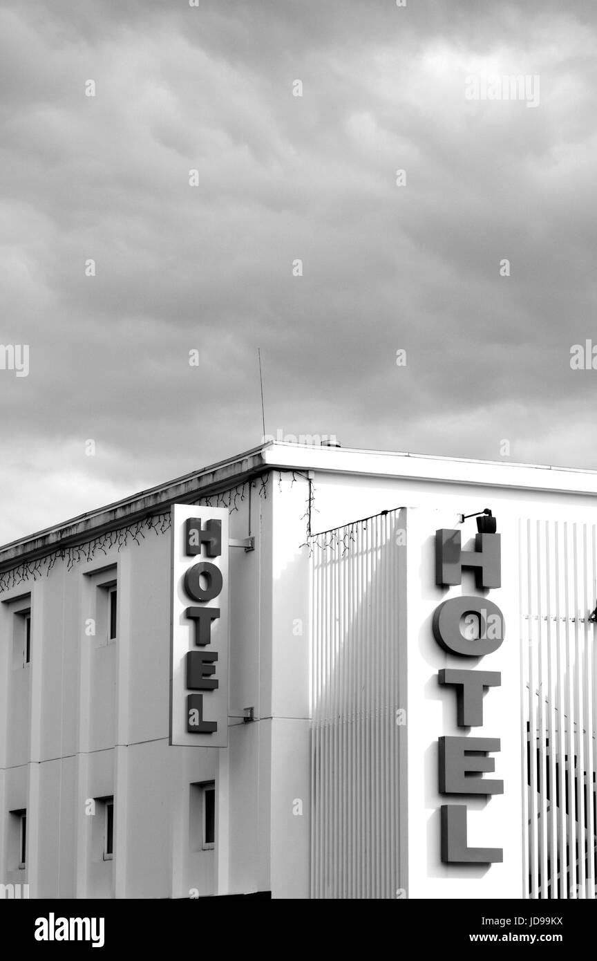 Staying in a hotel Black and White Stock Photos & Images - Alamy