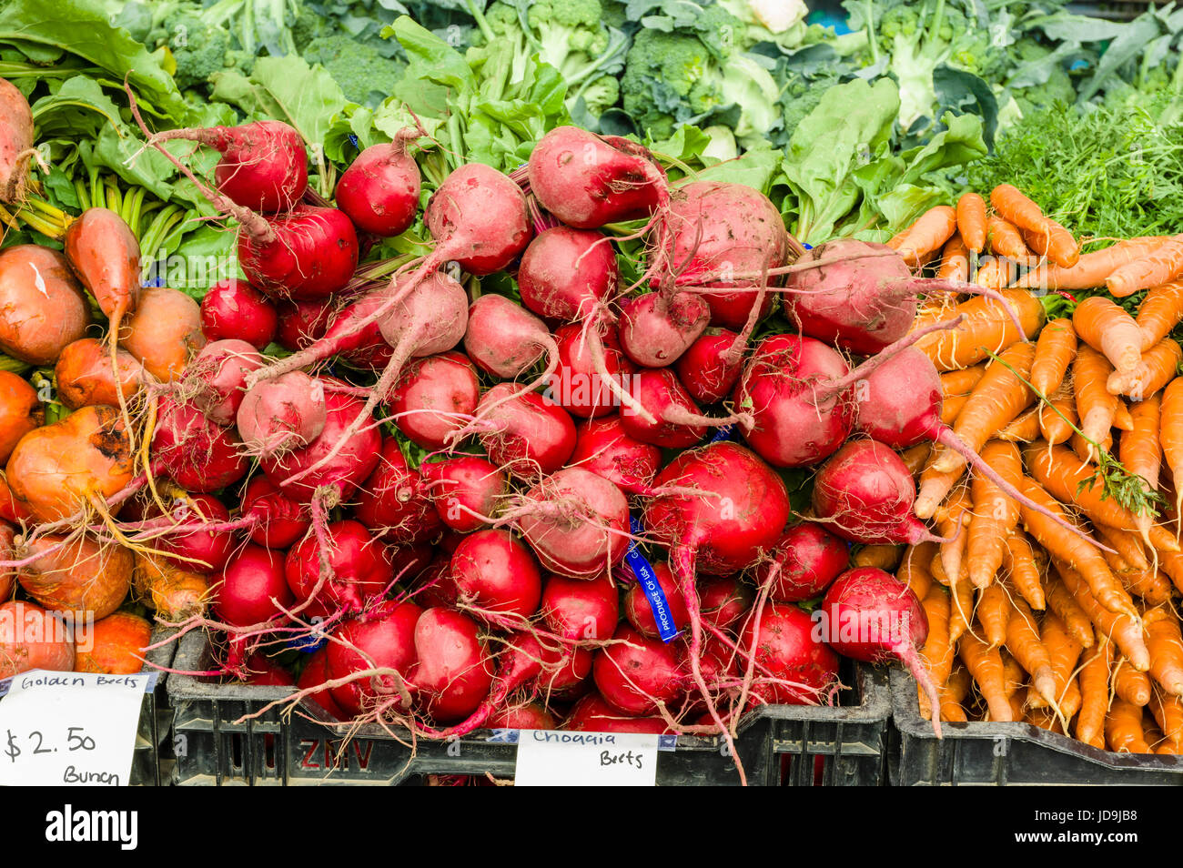 Display of red beets and carrots at the farm market Stock Photo - Alamy