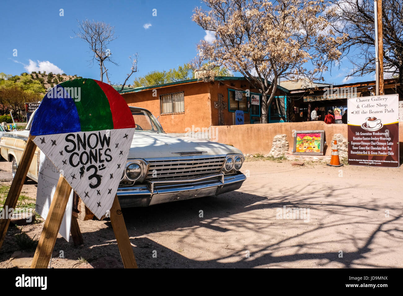 A snow cones sale sign and a classic car at Chimayo, New Mexico, United ...