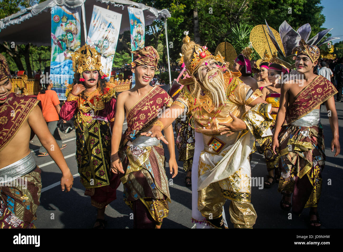 Balinese festival with traditionally dressed participants having fun at ...