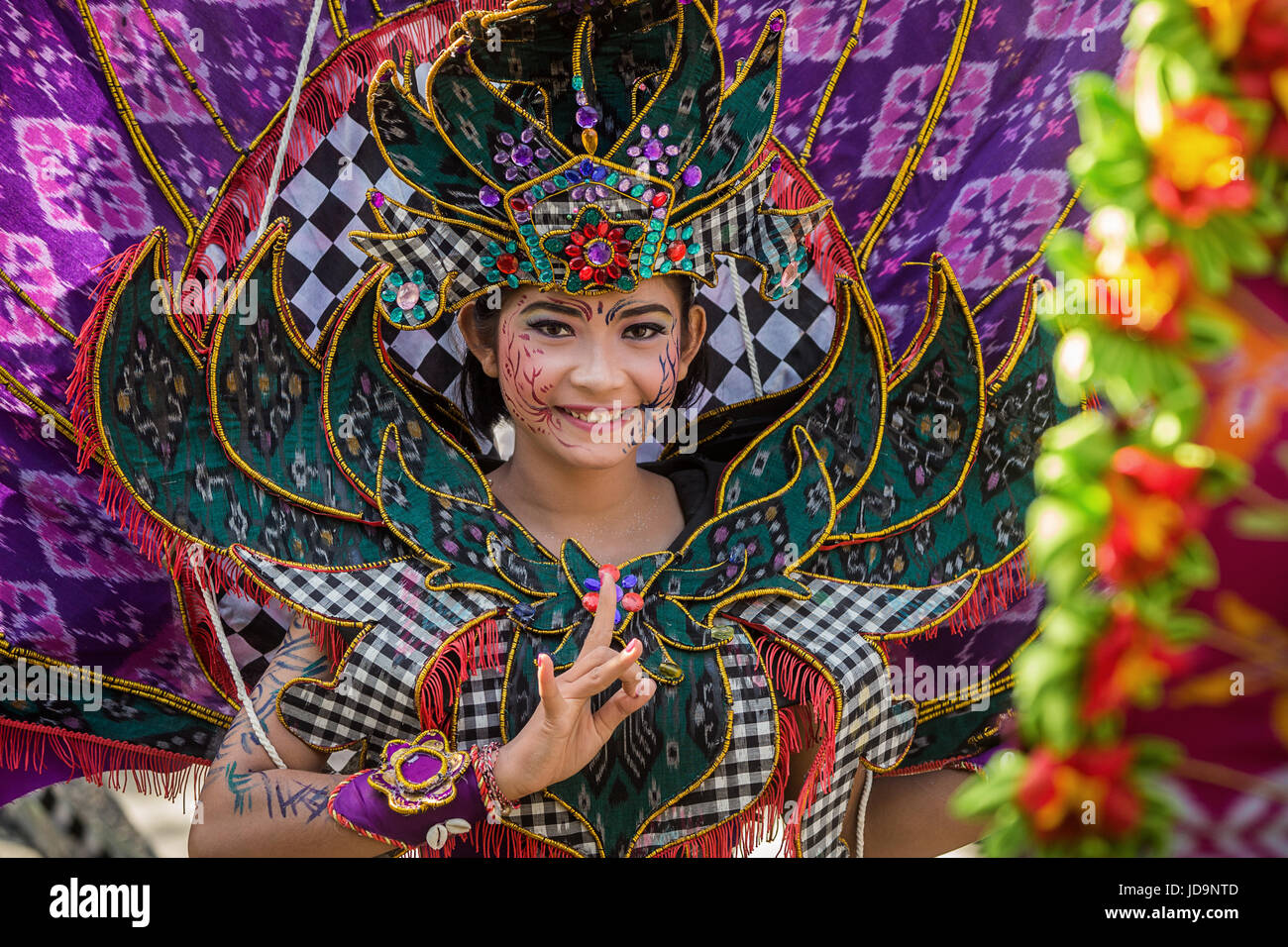 Balinese girl in full festival regalia at the Bali International Arts ...