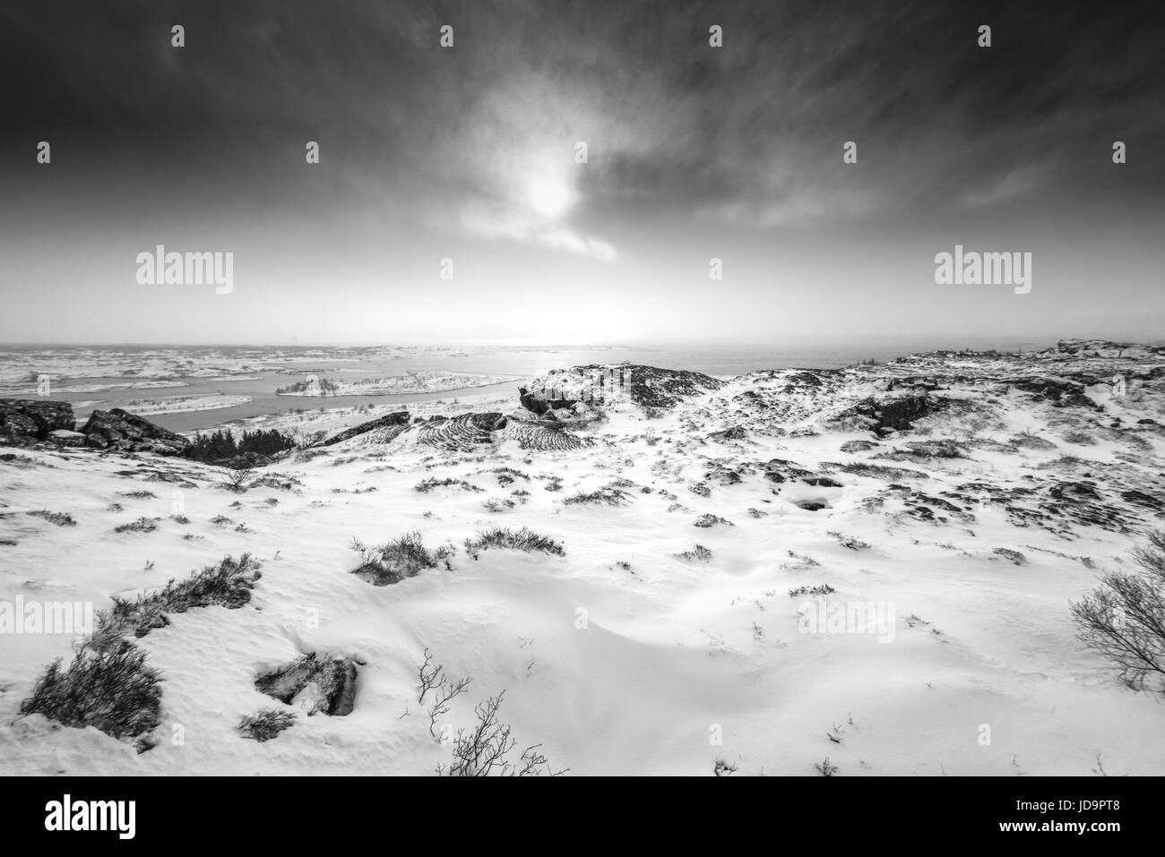 Snow covered rock formations and blue sky, Iceland, Europe, black and ...