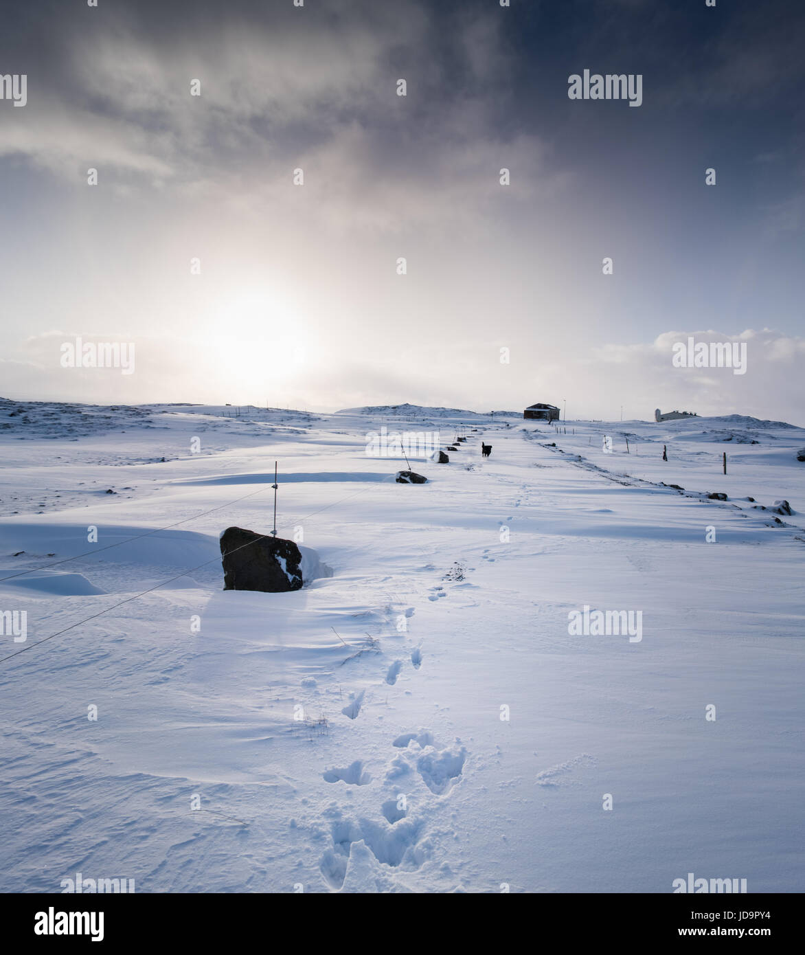 High angle view, in distance, building in snow coverd landscape ...