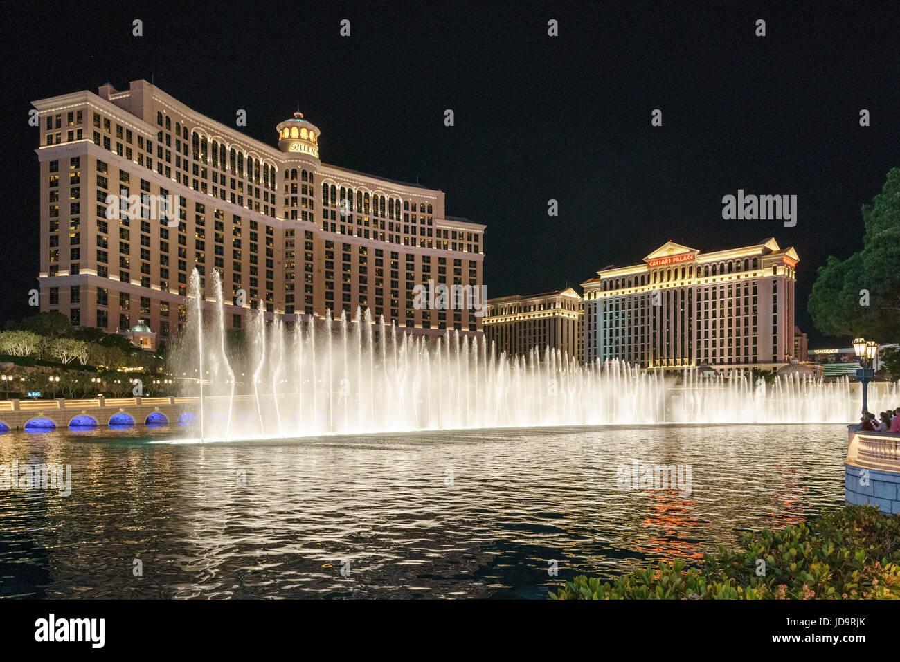 Exterior view of Bellagio hotel at night with fountains, Las Vegas ...