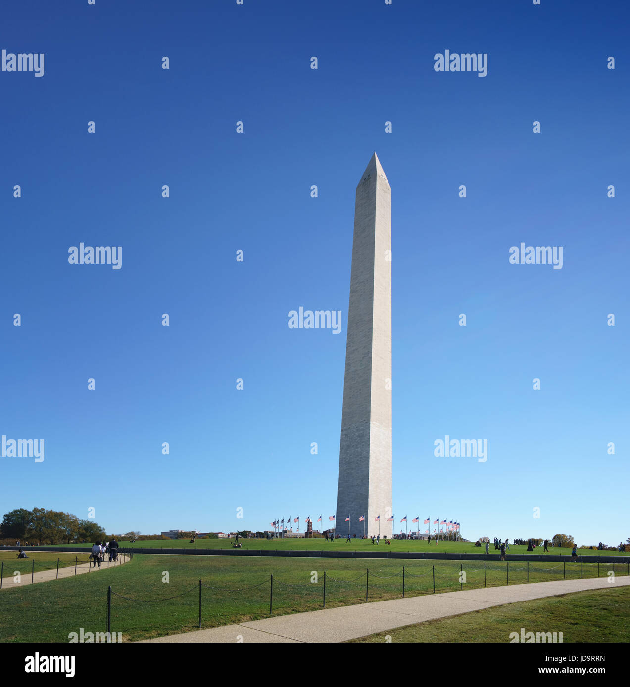 Distant view of Washington obelisk encircled with flags, Washington DC ...