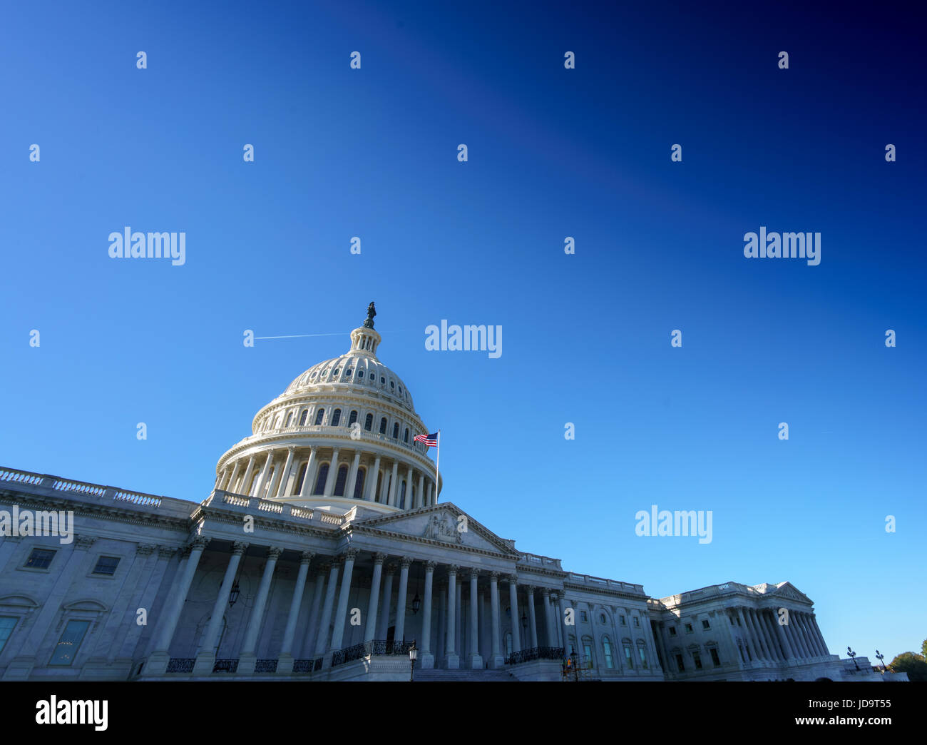 Capitol building exterior against clear blue sky, Washington DC, USA ...