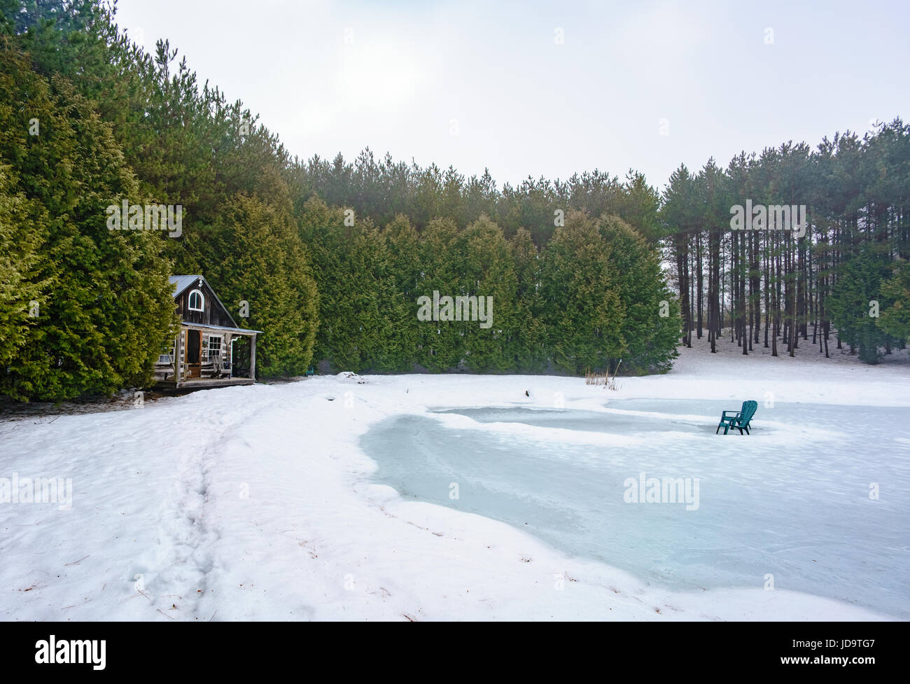 Outdoors with cabin in rural setting in winter, Ontario, Canada ...