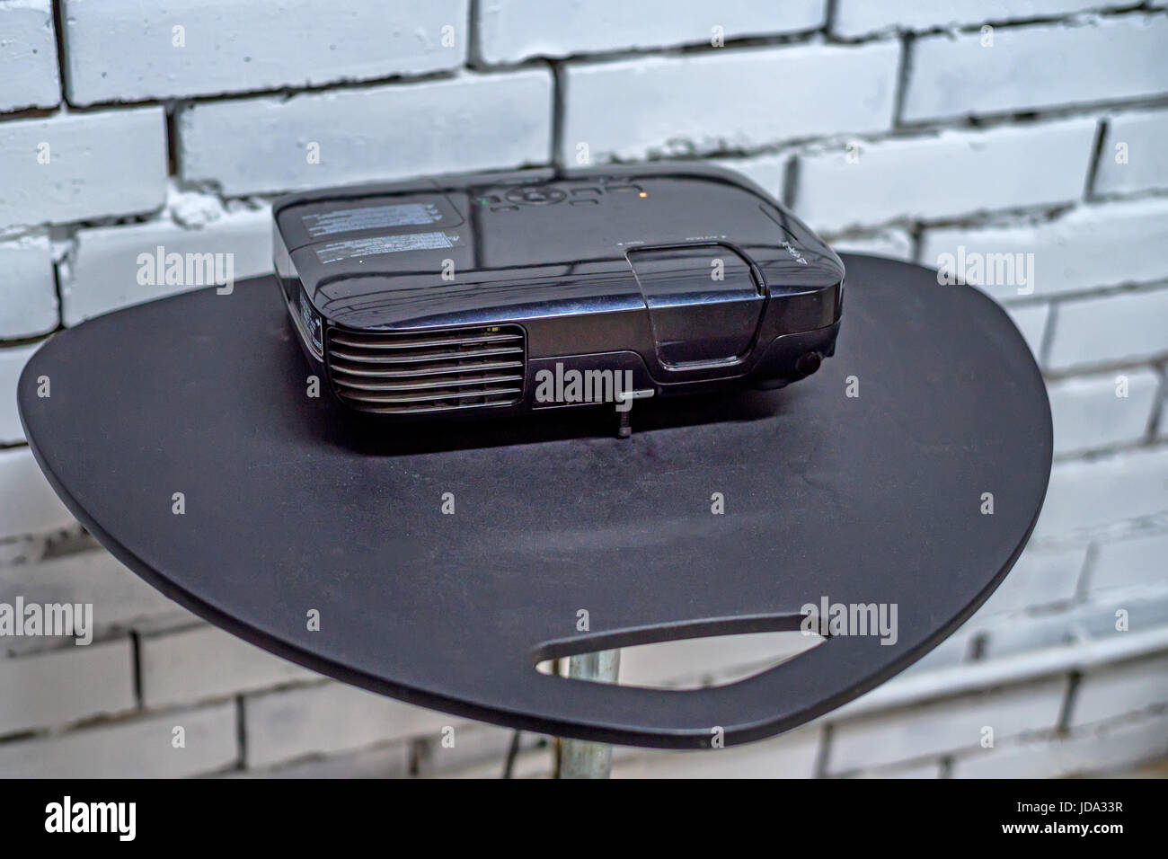 Digital multimedia projector standing on hi-res stock photography and ...