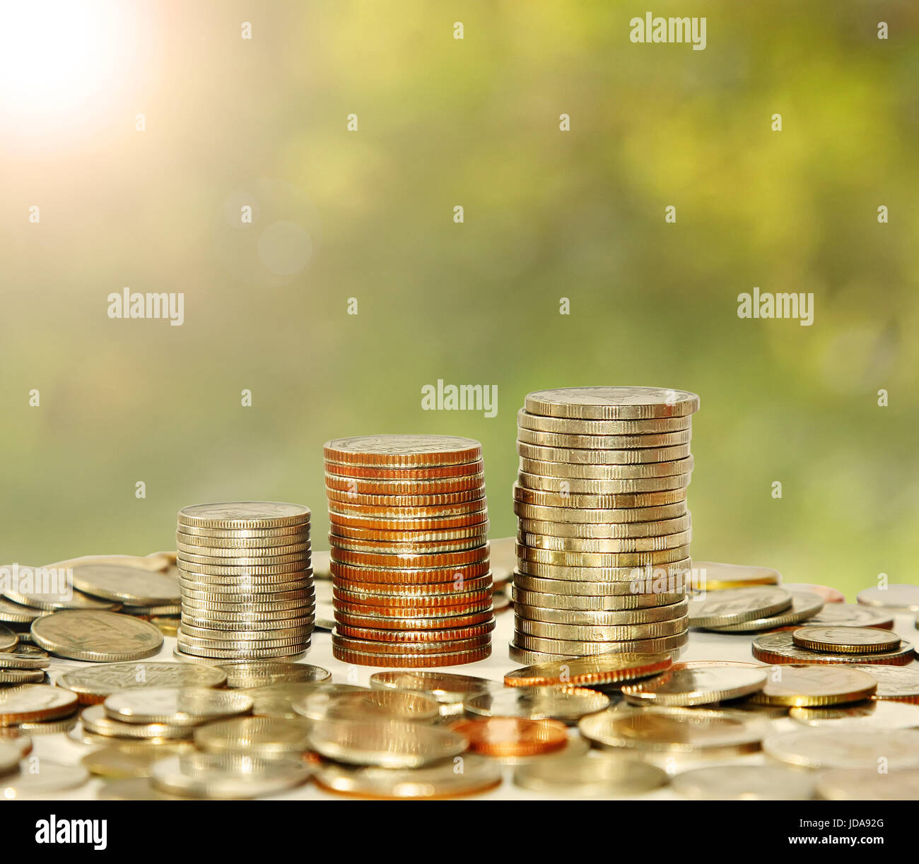 Finance and save money concept, Money coin stack growing graph with ...