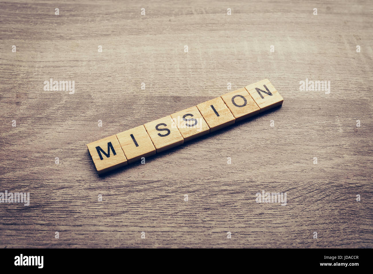 Mission word on wood table for business concept Stock Photo - Alamy