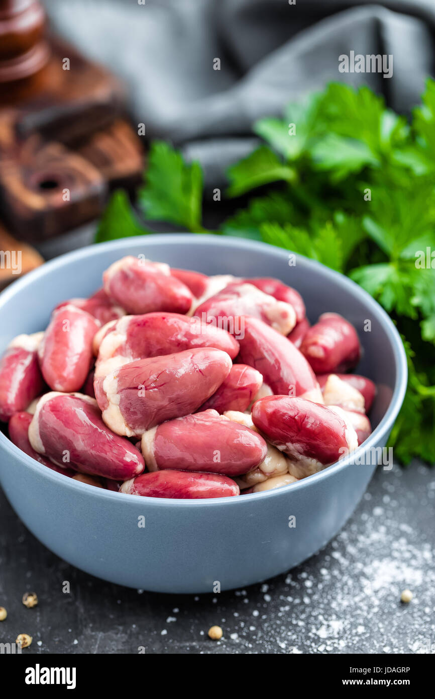 raw chicken hearts Stock Photo - Alamy