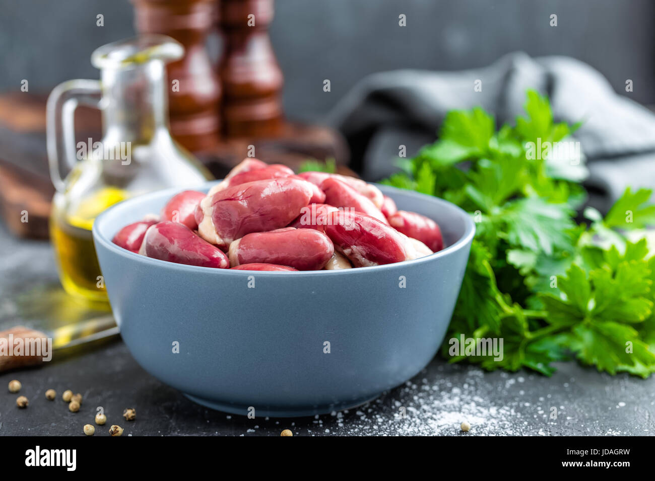raw chicken hearts Stock Photo - Alamy