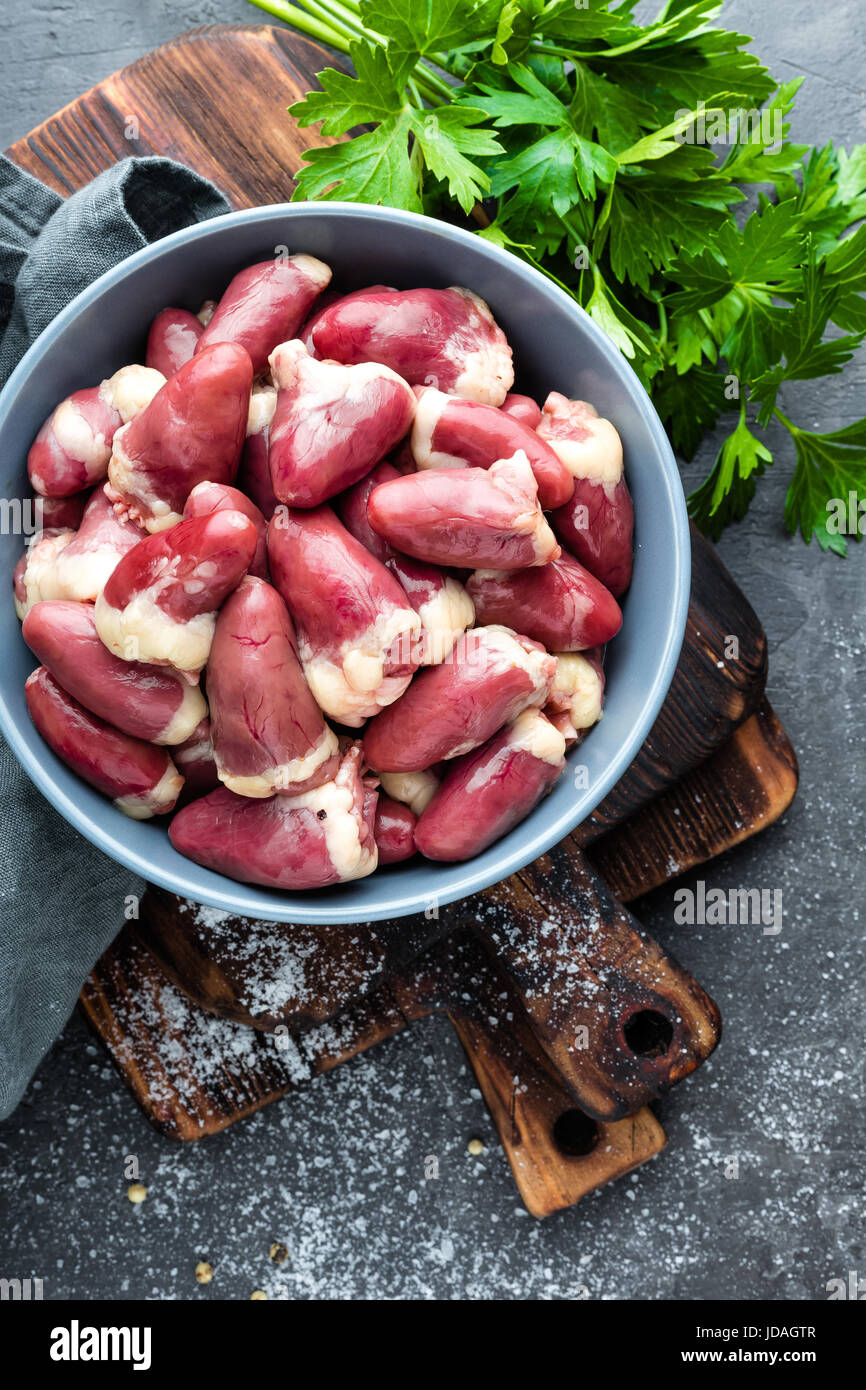 raw chicken hearts Stock Photo - Alamy