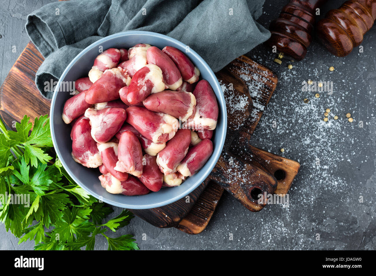 raw chicken hearts Stock Photo - Alamy