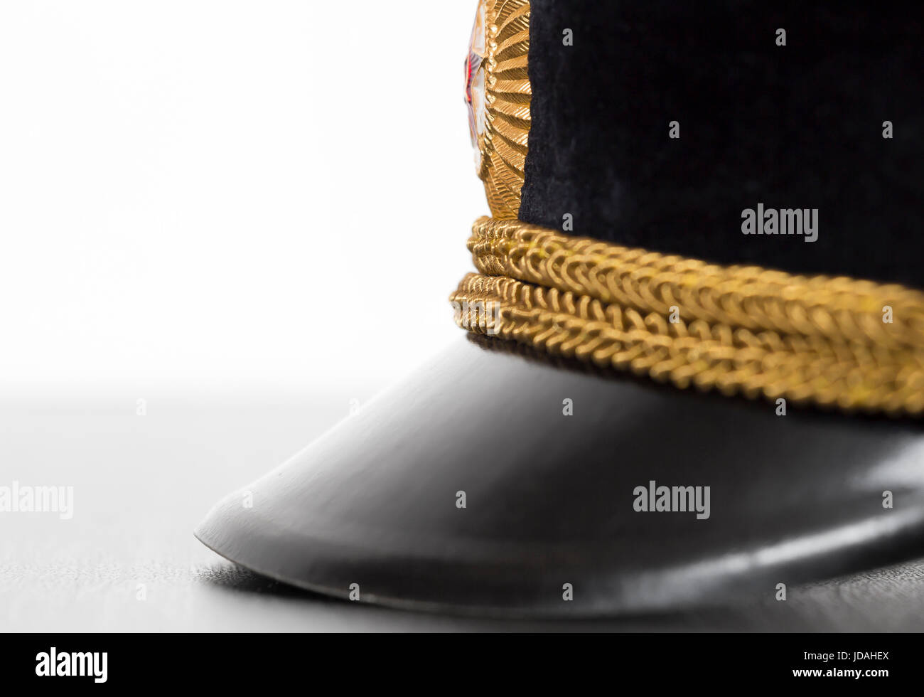 Visor military cap, lying on the table, close-up Stock Photo - Alamy