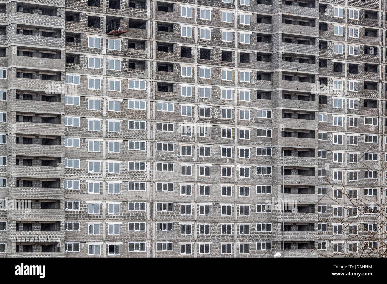 Under construction high-rise apartment building full frame Stock Photo ...