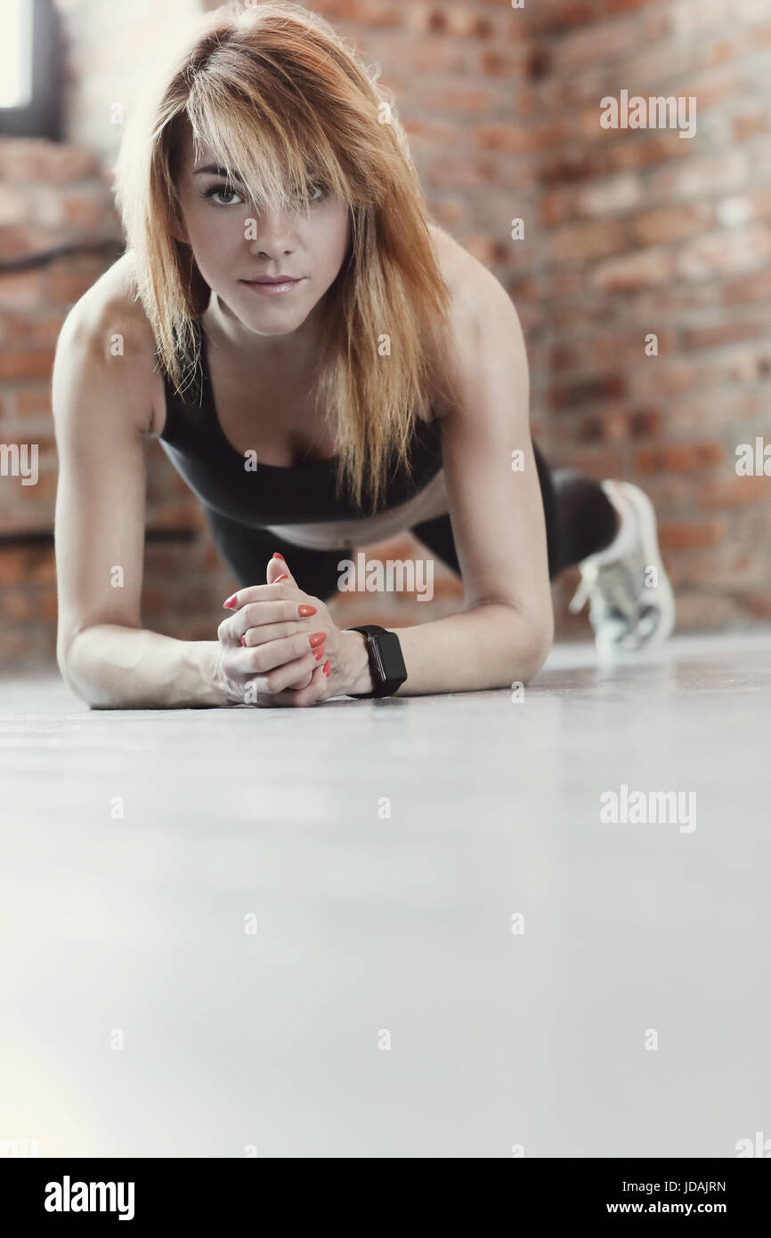 Fitness and workout. Woman in the gym Stock Photo - Alamy