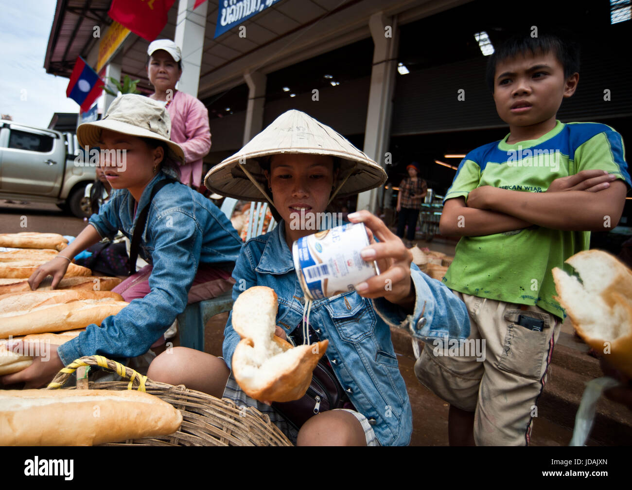 PAKSE, LAOS - AUGUST 12 : View of a market in Pakse city is the third ...