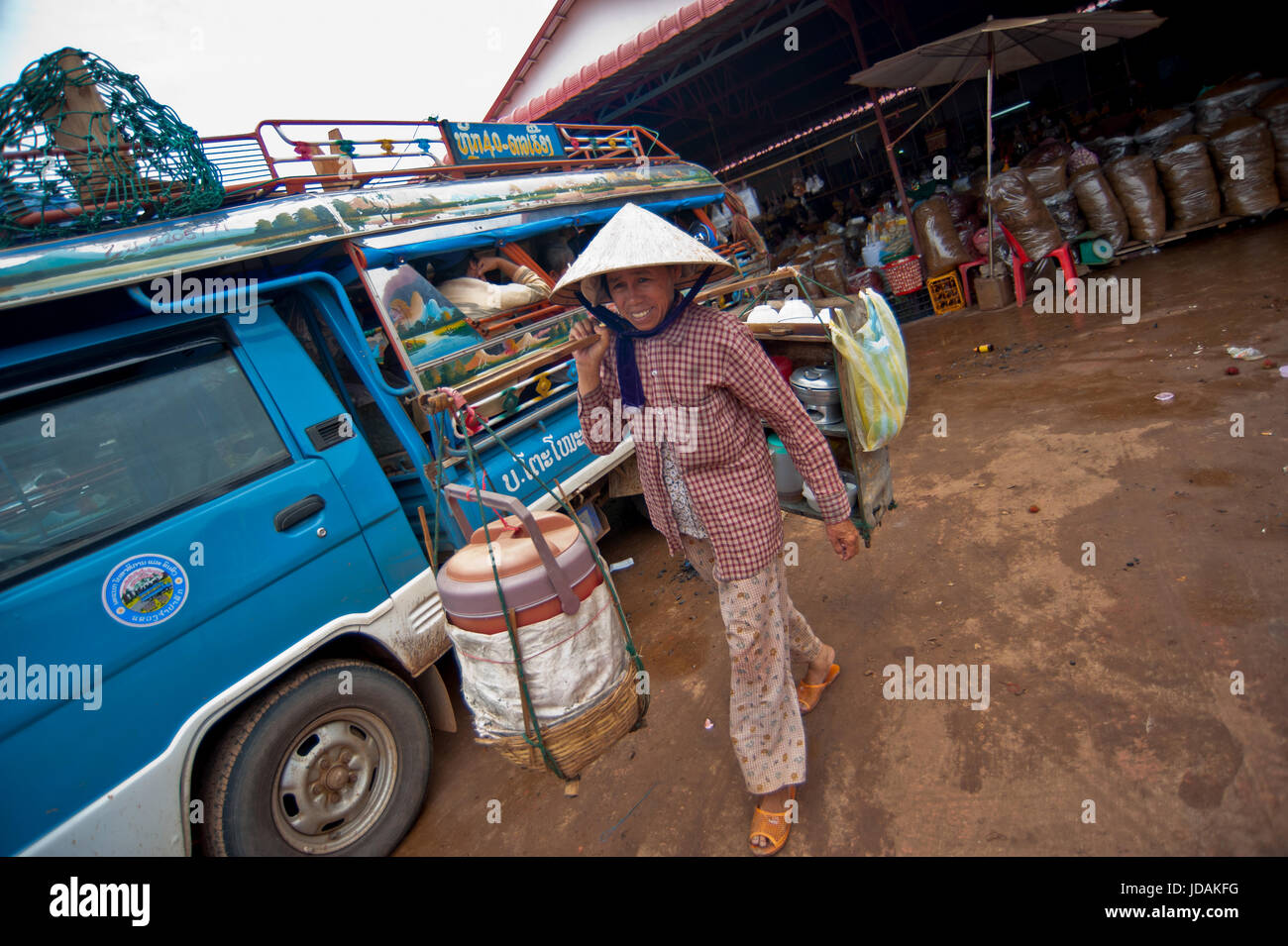 PAKSE, LAOS - AUGUST 12 : View of a market in Pakse city is the third ...