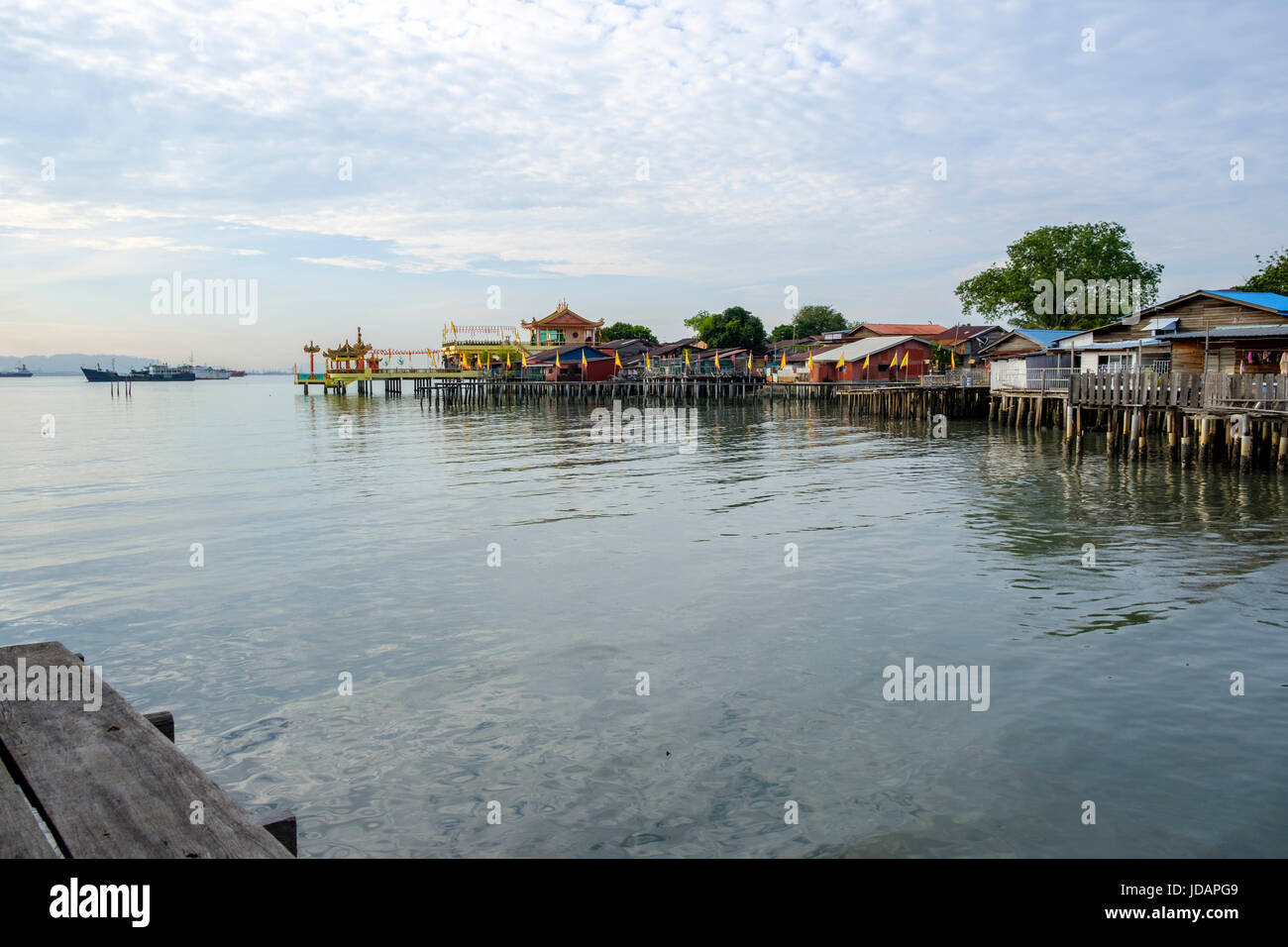 Hean Boo Temple and houses on stilts seen from Mixed Clan Jetty, one of ...