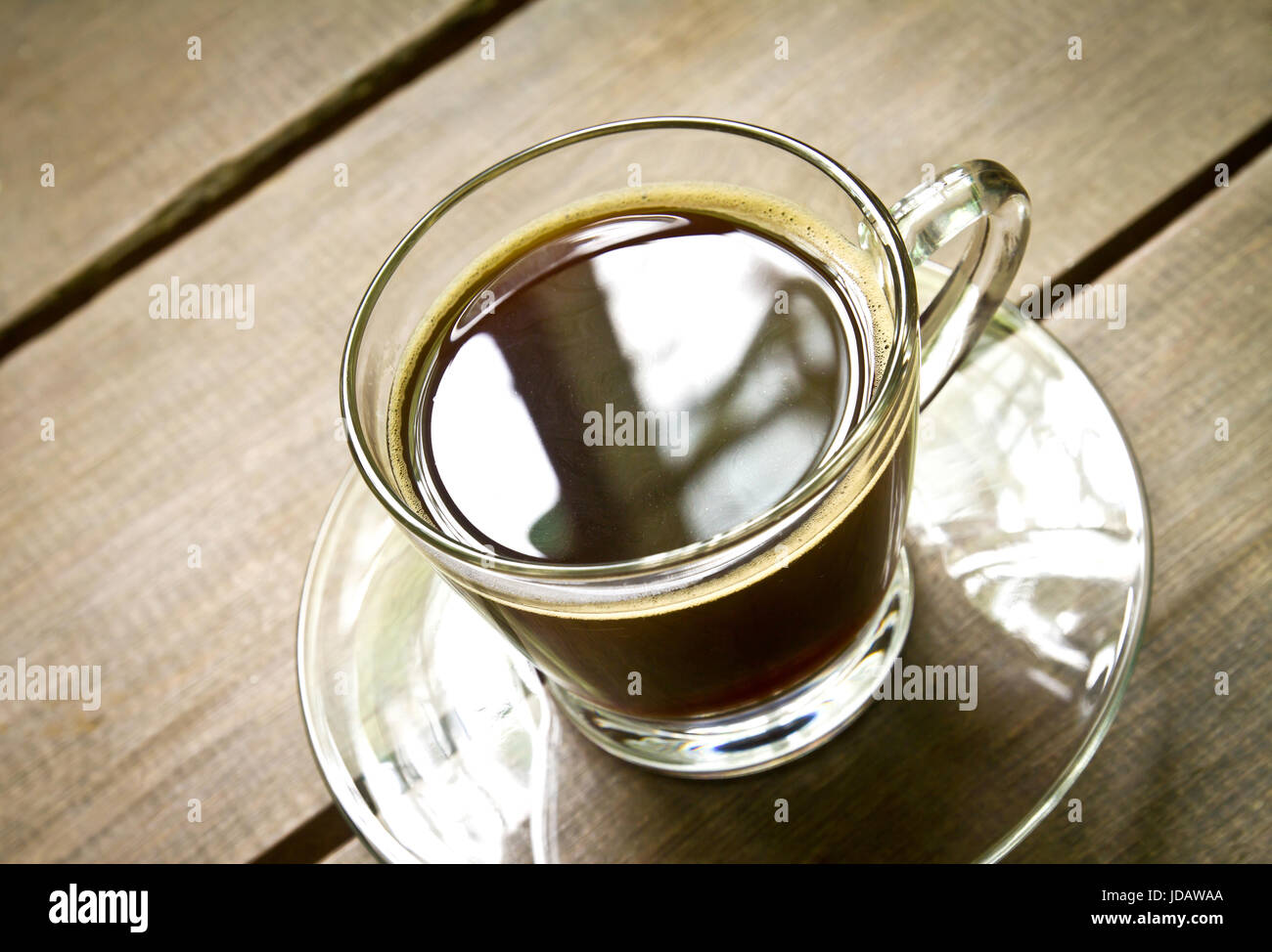 coffee americano in a glass on wood Stock Photo - Alamy