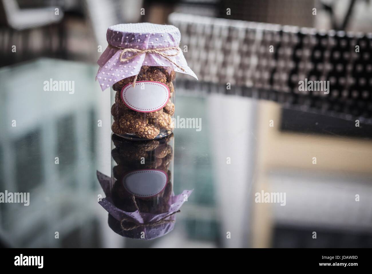 Cookies inside jar with white blank label Stock Photo - Alamy
