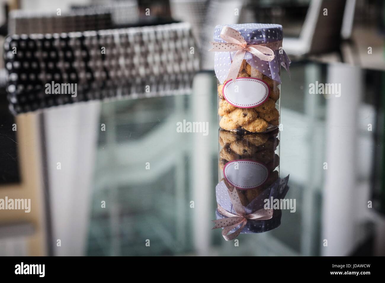Cookies inside jar with white blank label Stock Photo - Alamy