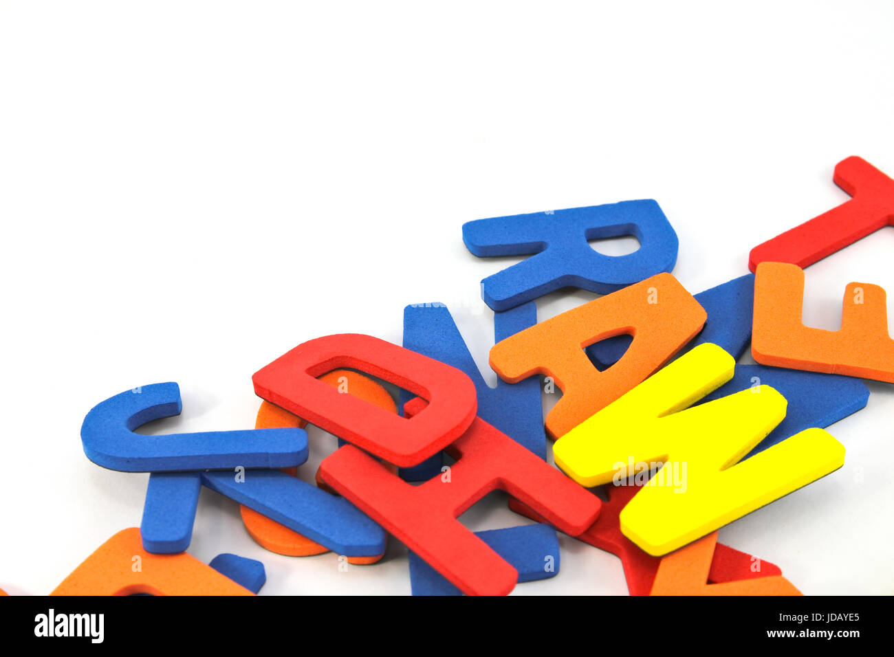 Stack of colorful foam letters over white background Stock Photo - Alamy