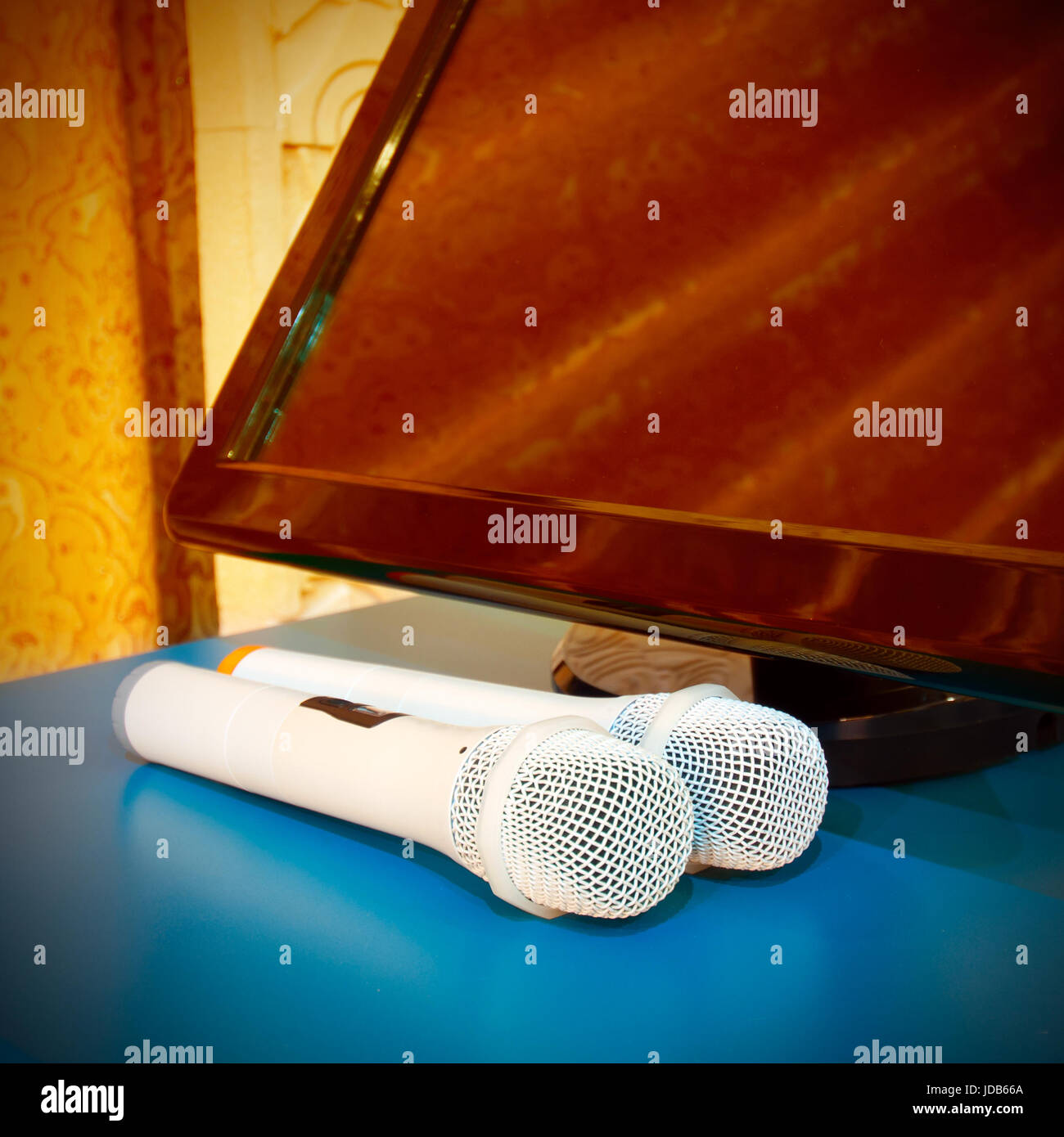 On display next to a pair of microphones, a strong color contrast Stock ...