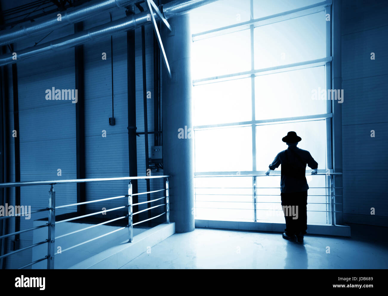 Stood by window hi-res stock photography and images - Alamy