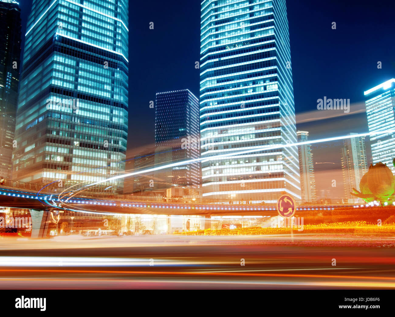 The light trails on the modern building background in shanghai china ...