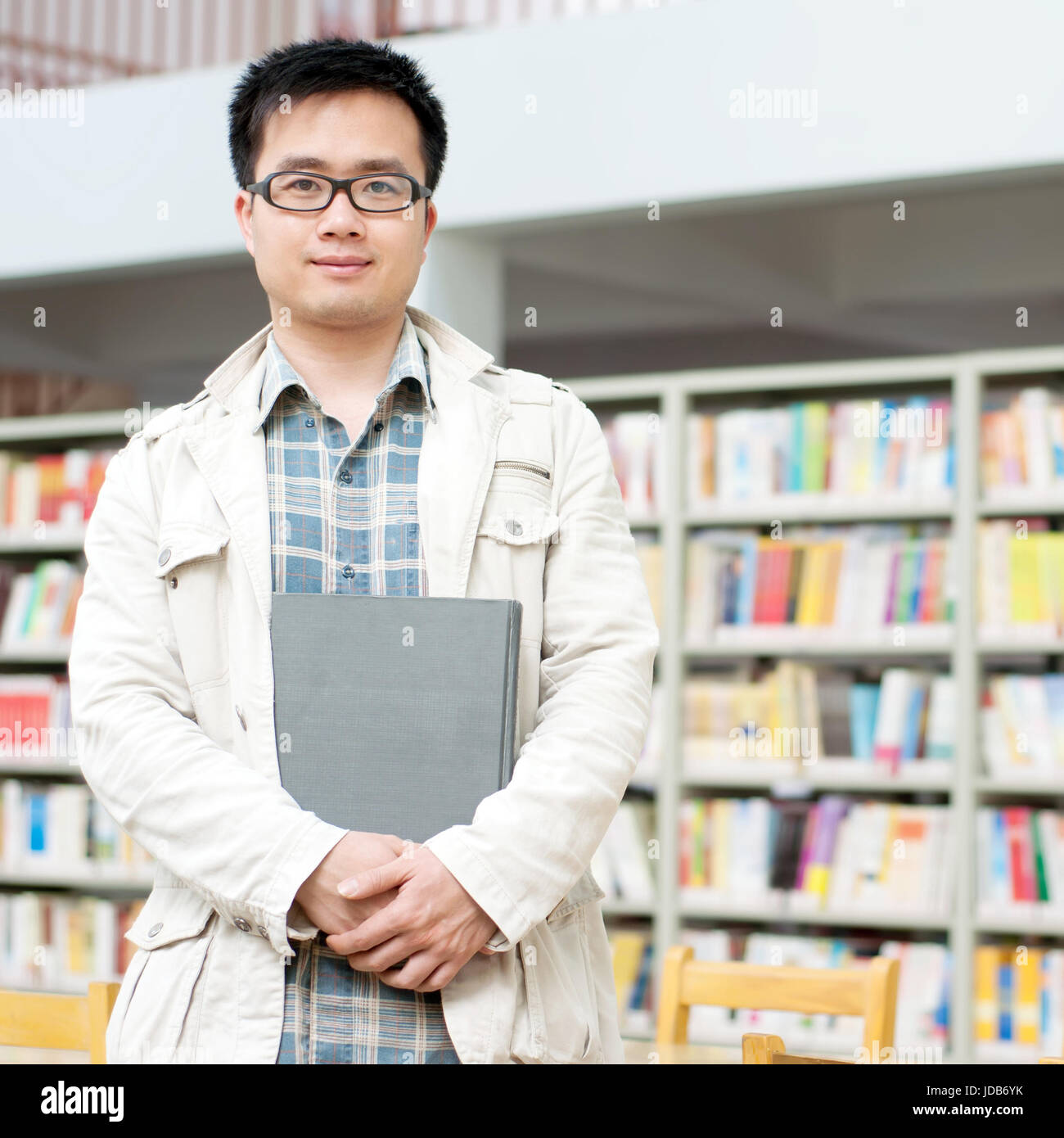 Pictures of handsome men in the library Stock Photo - Alamy